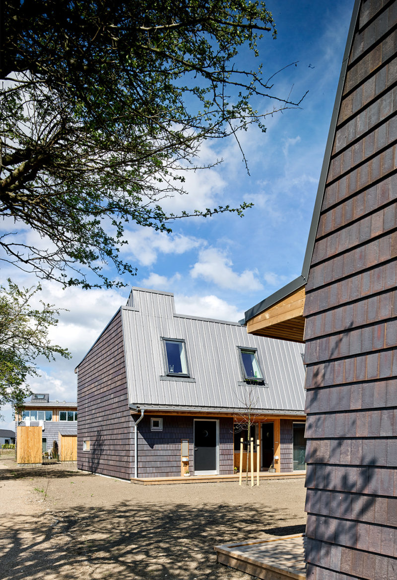 Terraced housing in solid wood CLT by Vandkunsten Architects